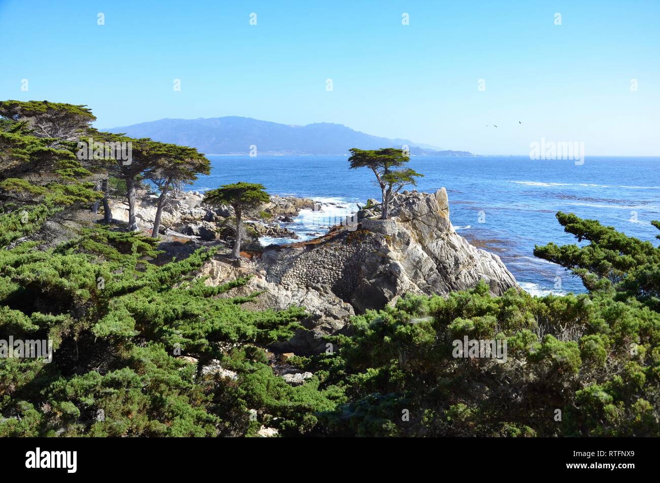Cliff rock pebble beach coast hi-res stock photography and images - Alamy