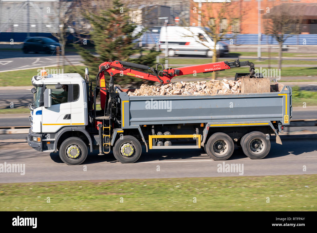 HGV dumper truck with Palfinger Epsilon reach arm grab. Full load of ...