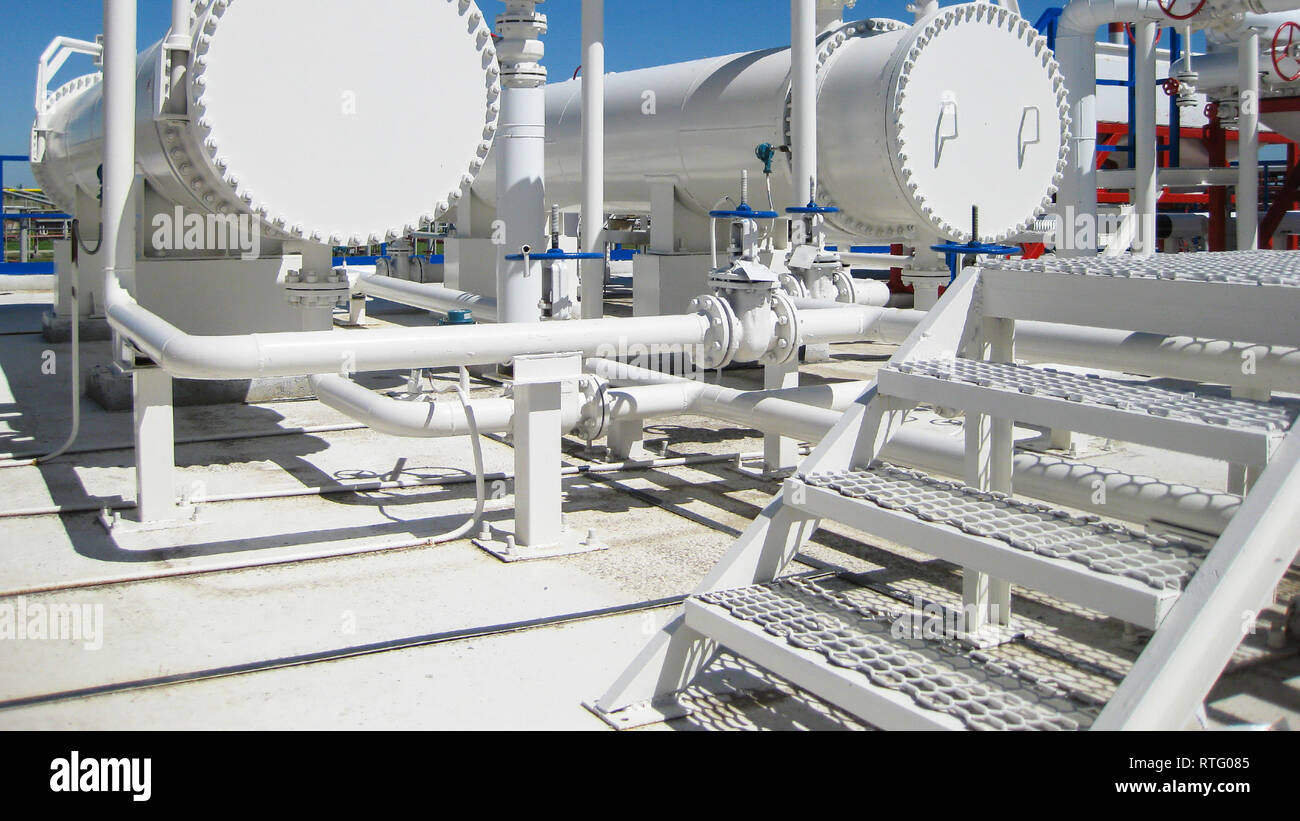 Heat exchangers in a refinery. The equipment for oil refining Stock ...