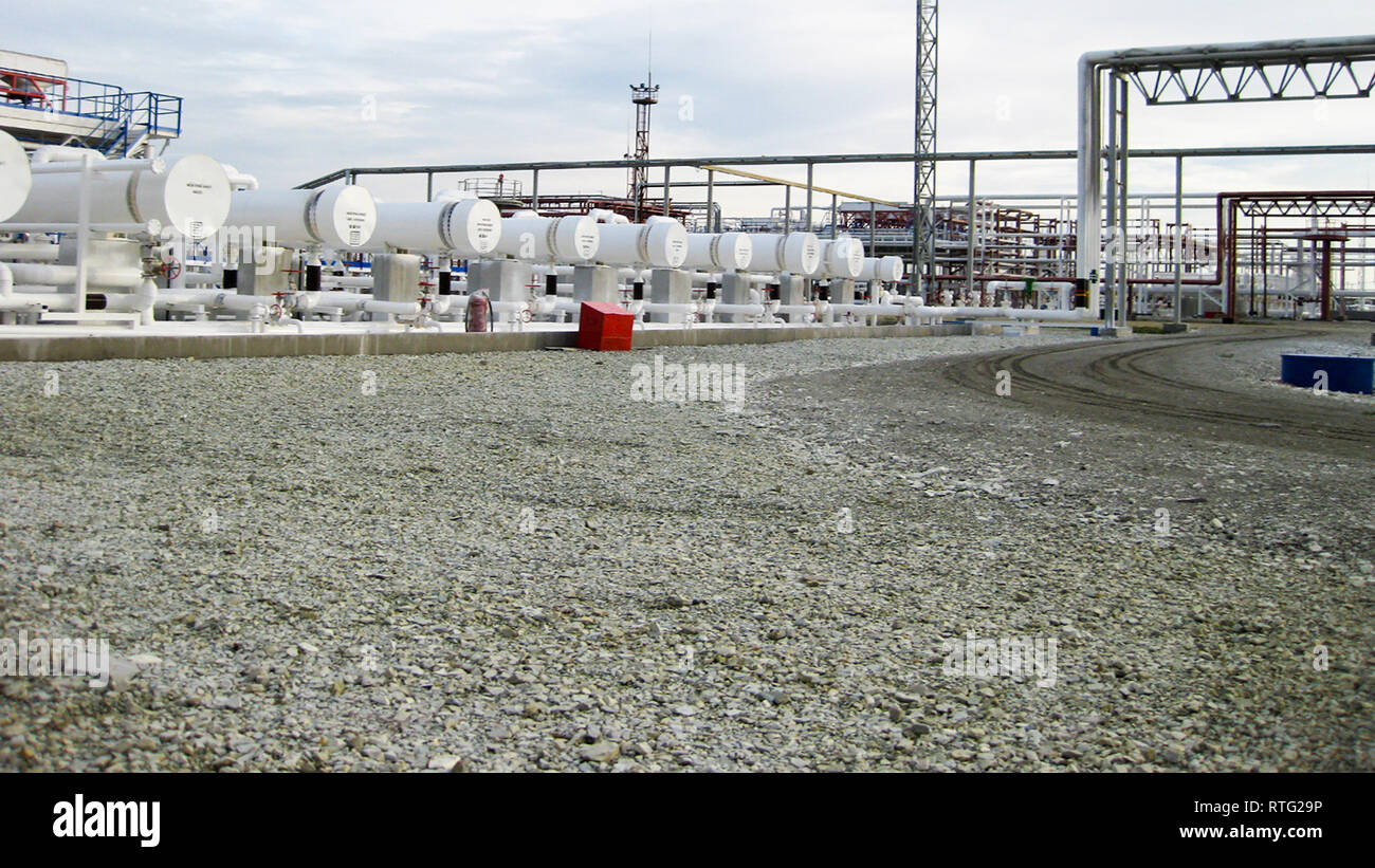 Heat exchangers in a refinery. The equipment for oil refining Stock ...