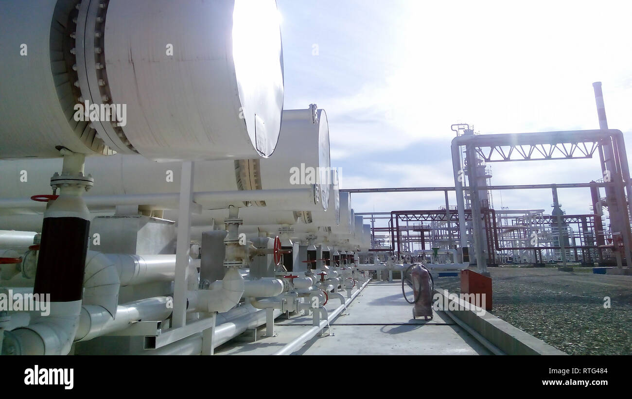 Heat exchangers in a refinery. The equipment for oil refining Stock ...