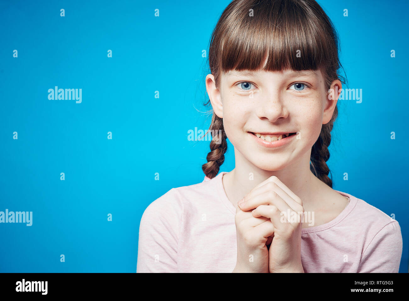 cute smiling pretty girl. emotion and facial expression Stock Photo - Alamy