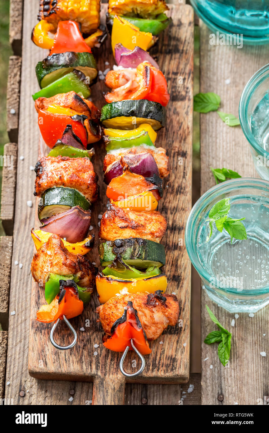 Crispy grilled skewers made of meat and vegetables Stock Photo - Alamy