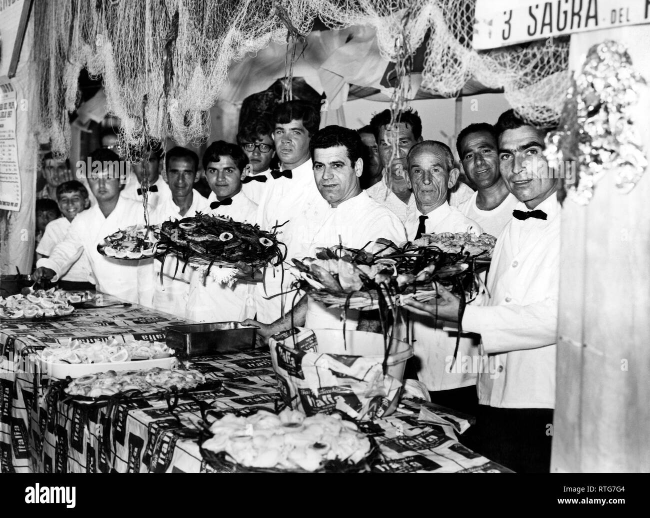 Italy, puglia, mola di Bari, waiters at the III Festival of the People ...