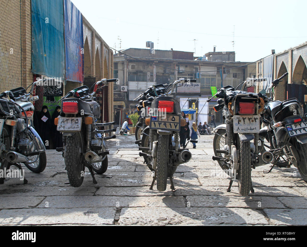 Tehran, Iran - June 12, 2018: Row of motorcycles in front of a ...
