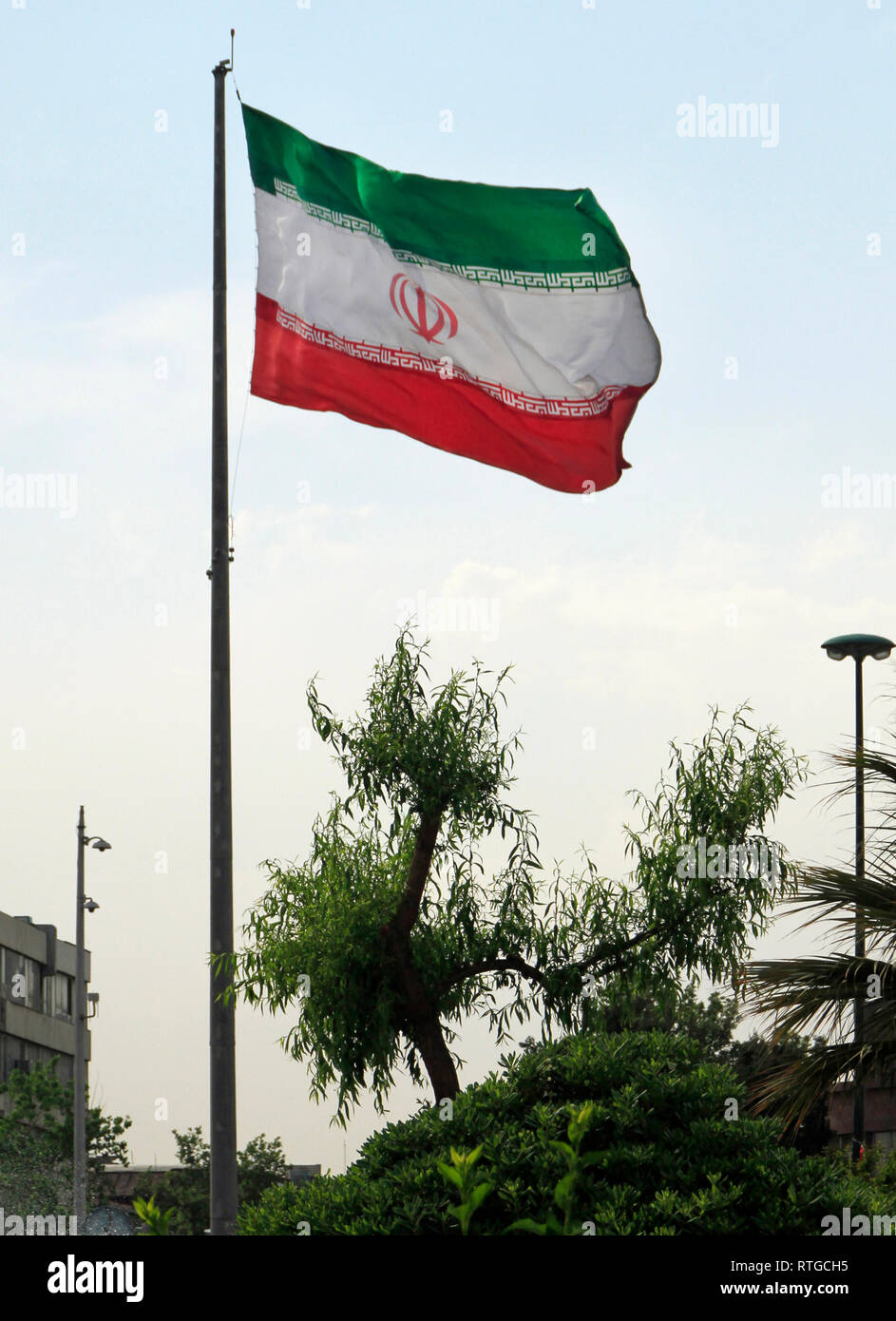 Big Iranian flag in the wind in Tehran, Iran Stock Photo - Alamy