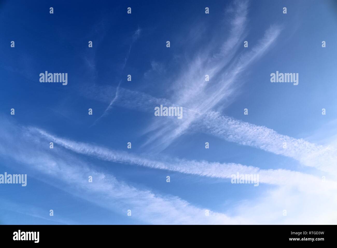 Aircraft contrails in the blue sky taken in northern germany Stock ...