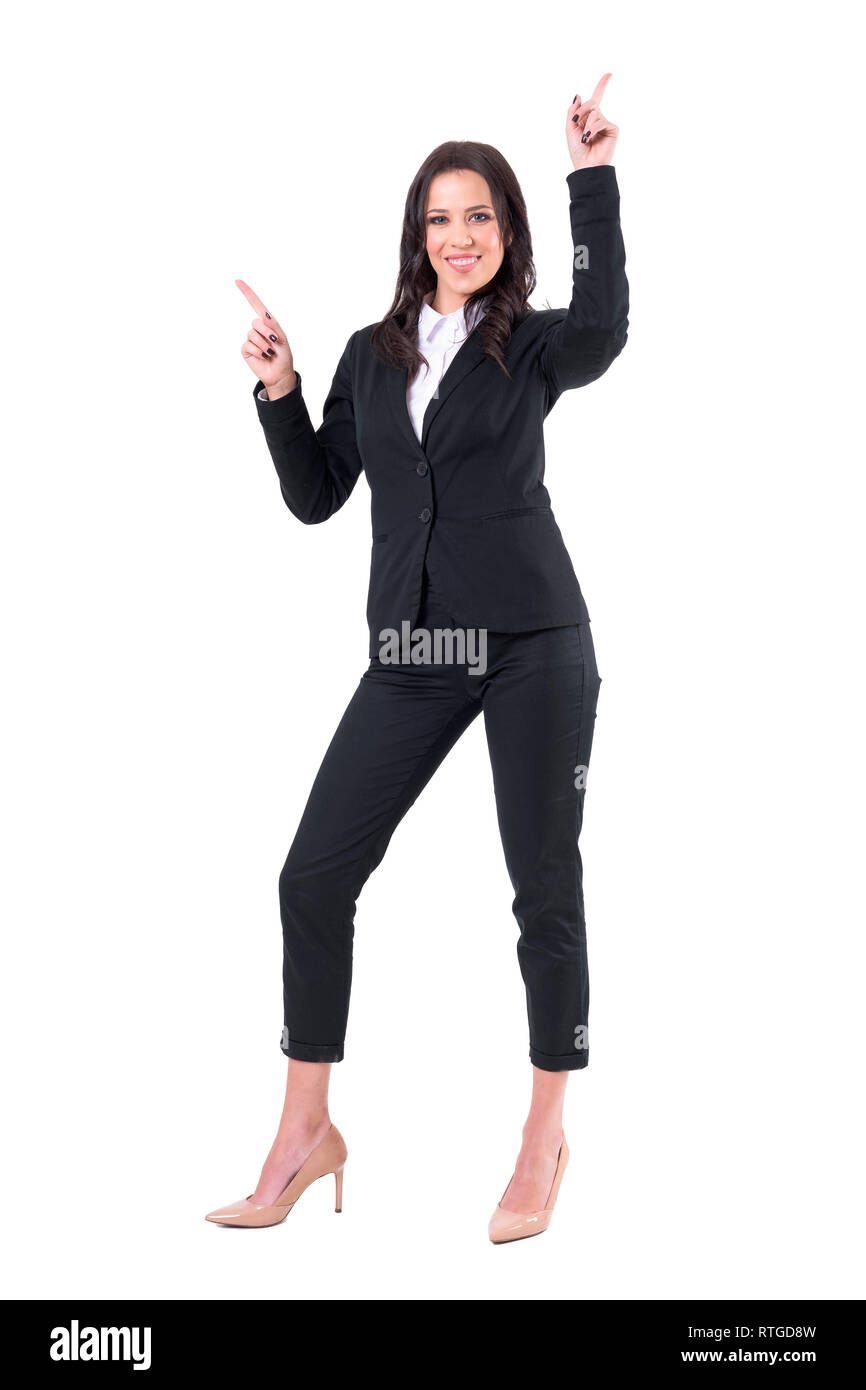 Happy successful relaxed business woman dancing with fingers pointing ...