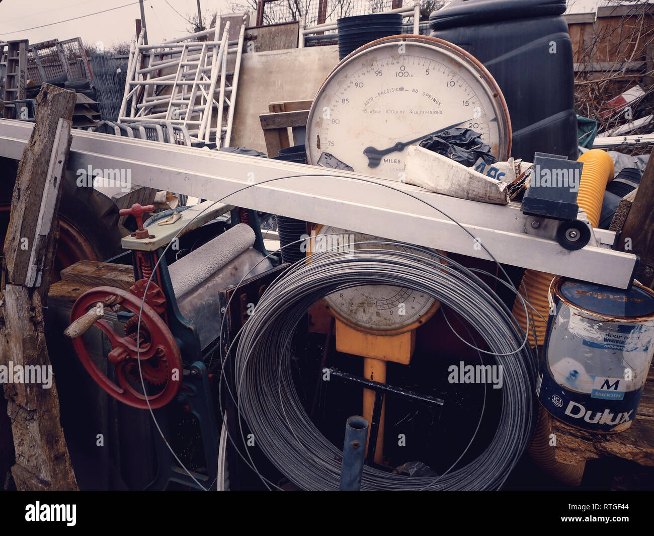 Industrial scales and a vintage mangle at a salvage yard in the UK ...