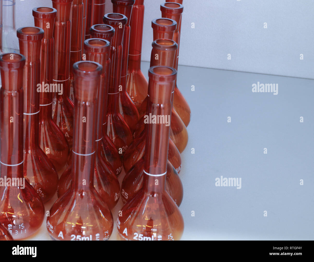 Brown medical flasks Stock Photo - Alamy