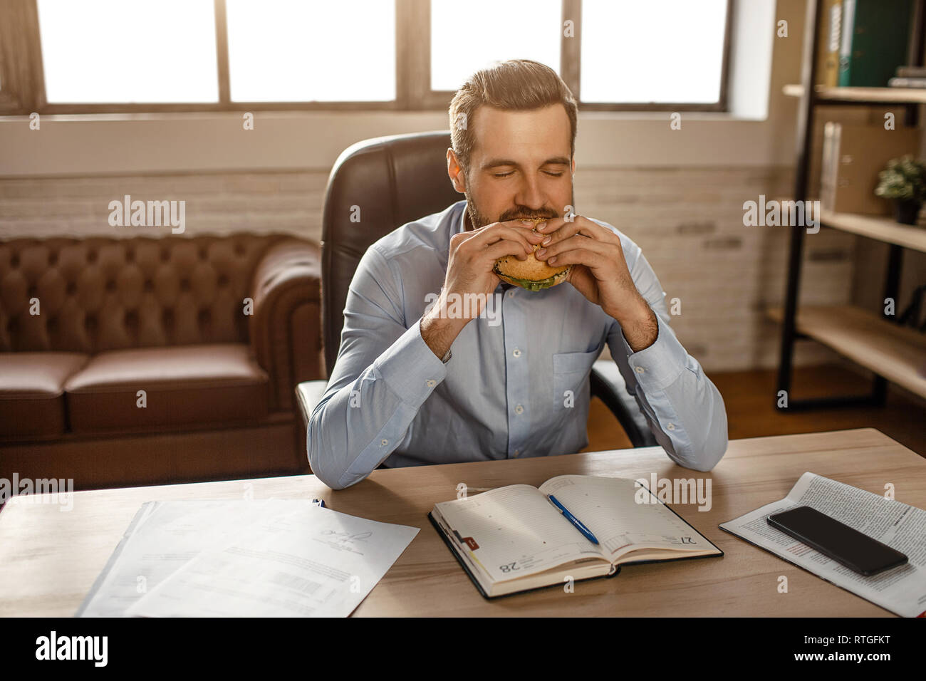 Man biting table hi-res stock photography and images - Alamy
