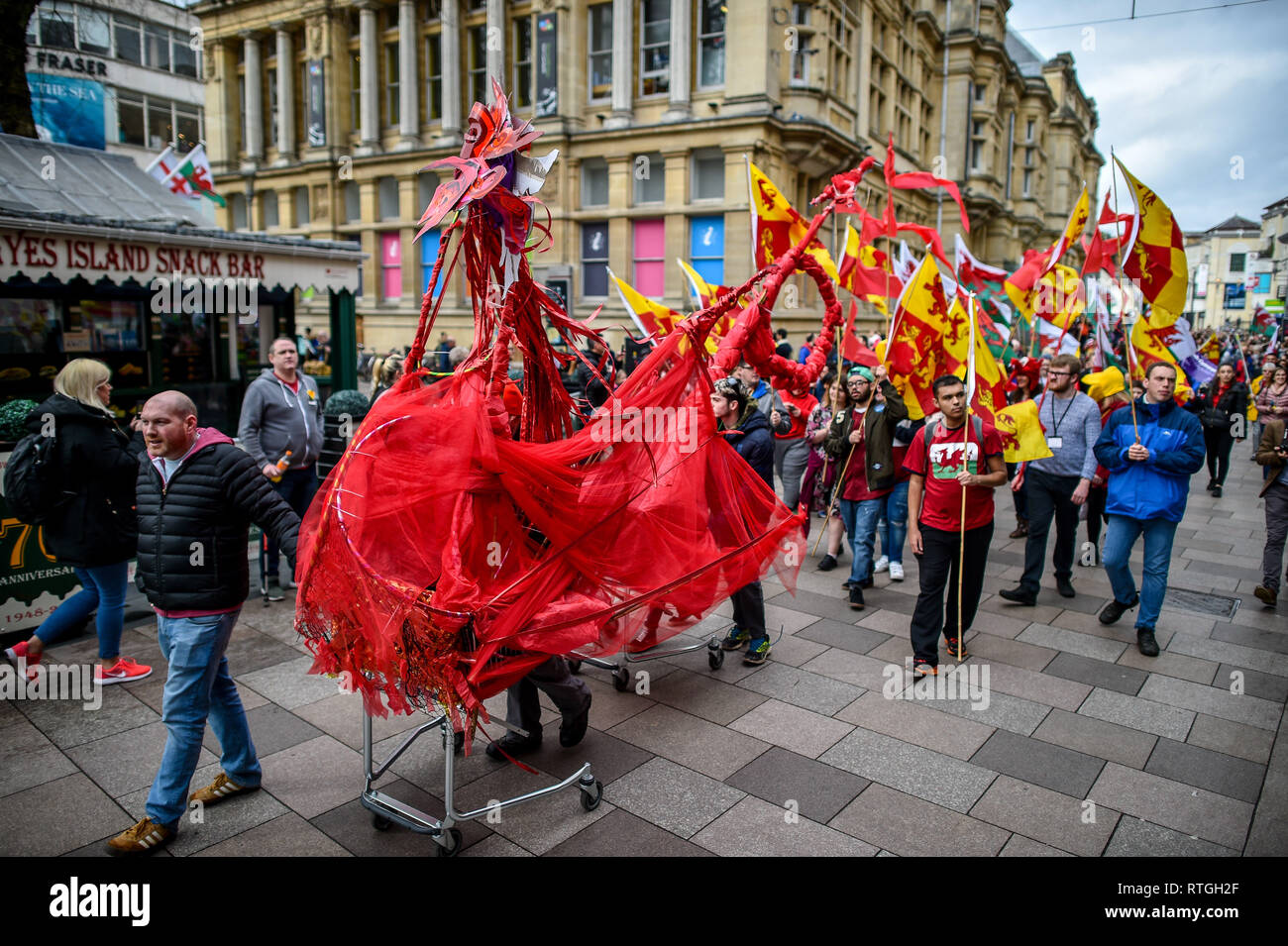 A Welsh red dragon is pulled along during a St David's Day Parade in ...