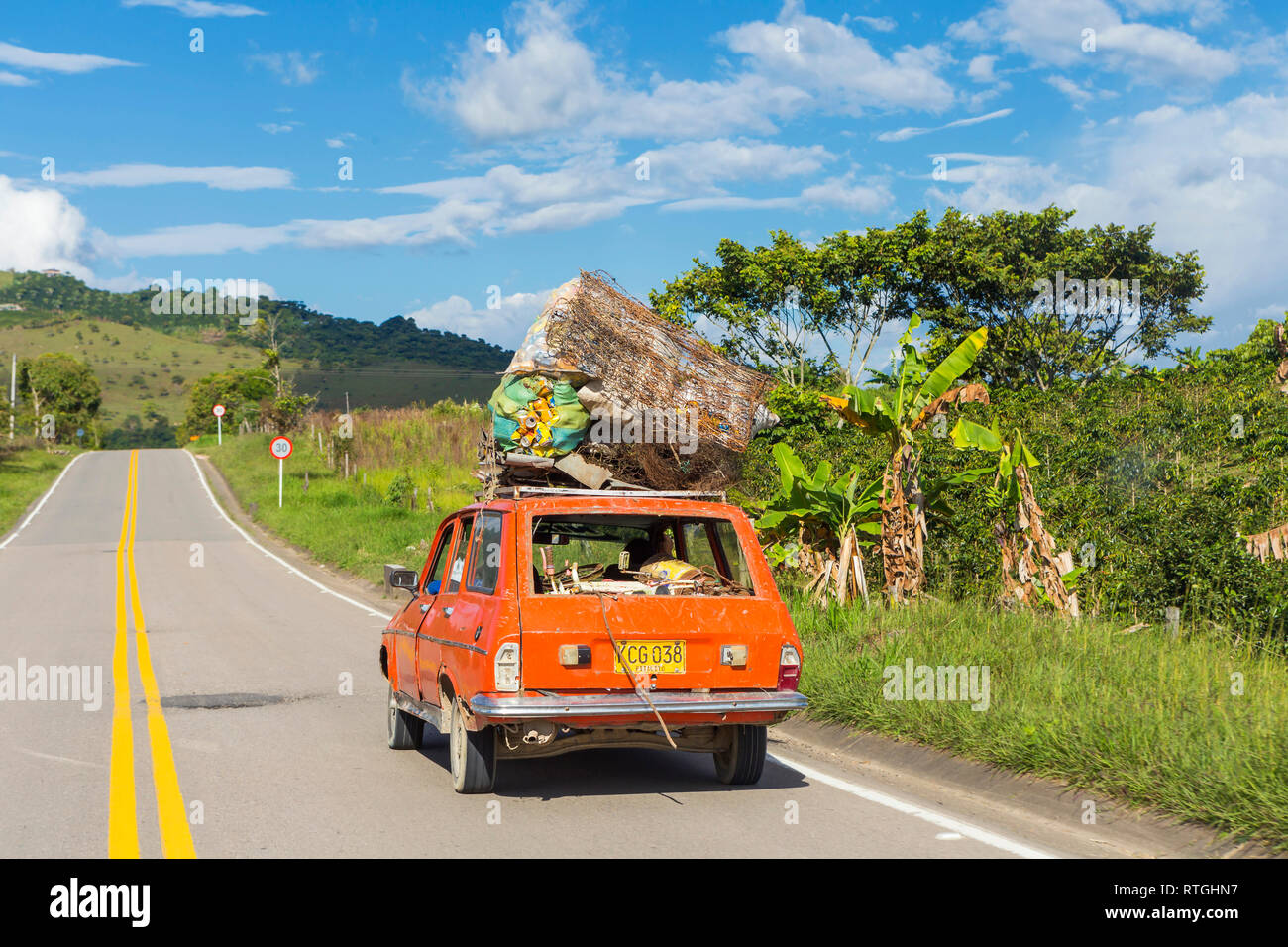 Vintage car on the road, Colombia Stock Photo - Alamy