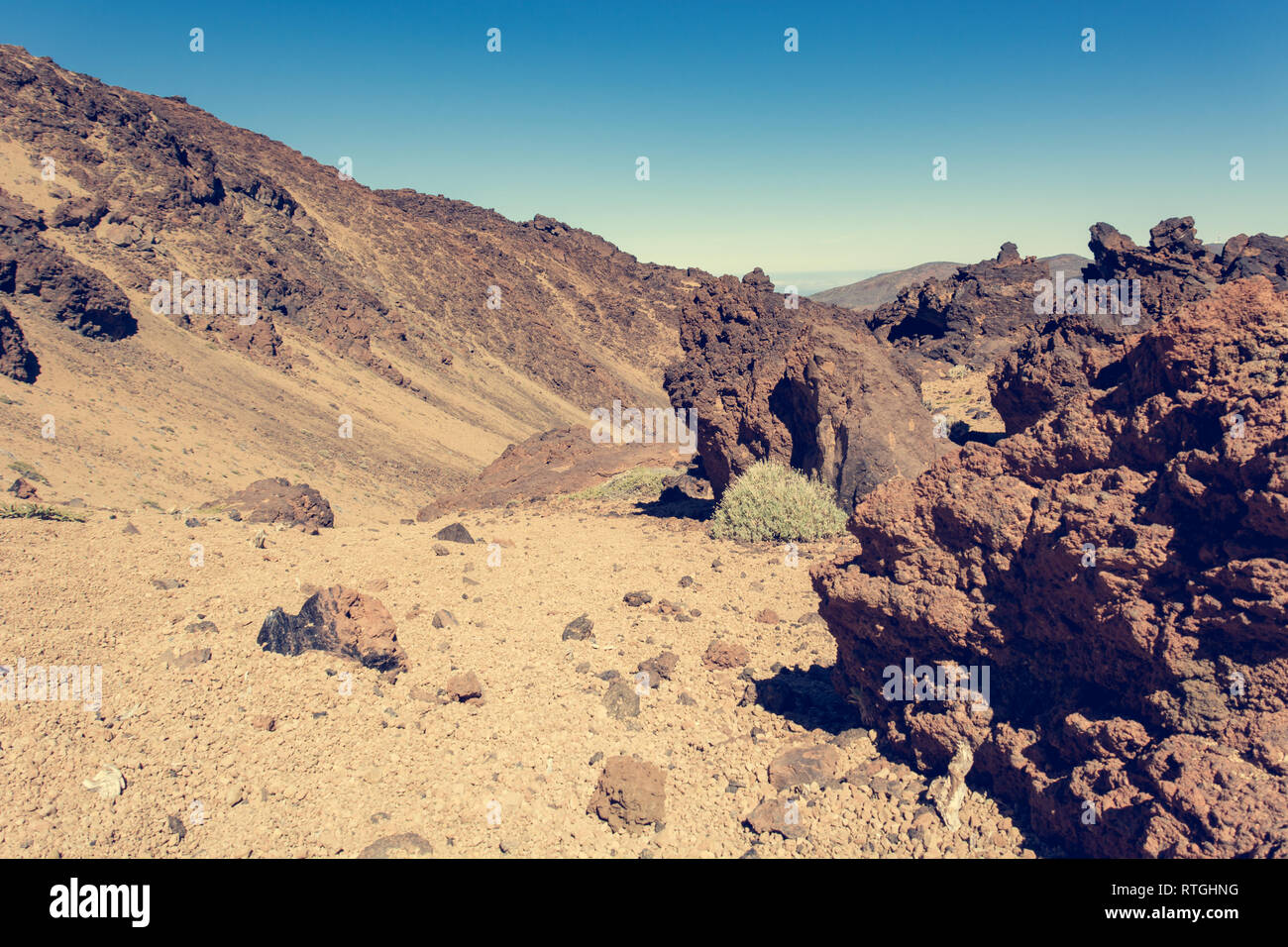 Spectacular volcanic landscape in desert environment with wicked lava ...