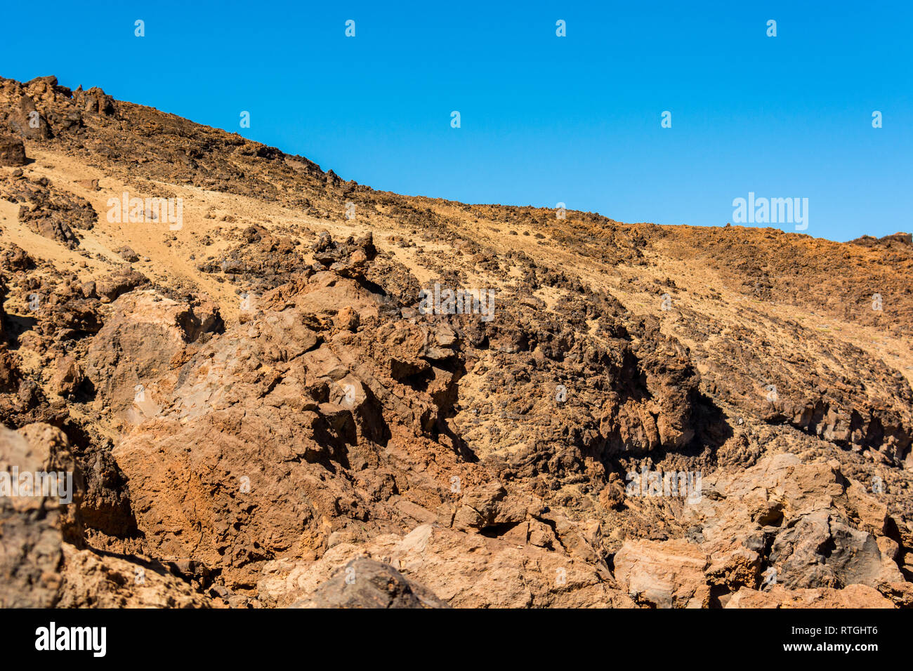 Spectacular volcanic landscape in desert environment with wicked lava ...