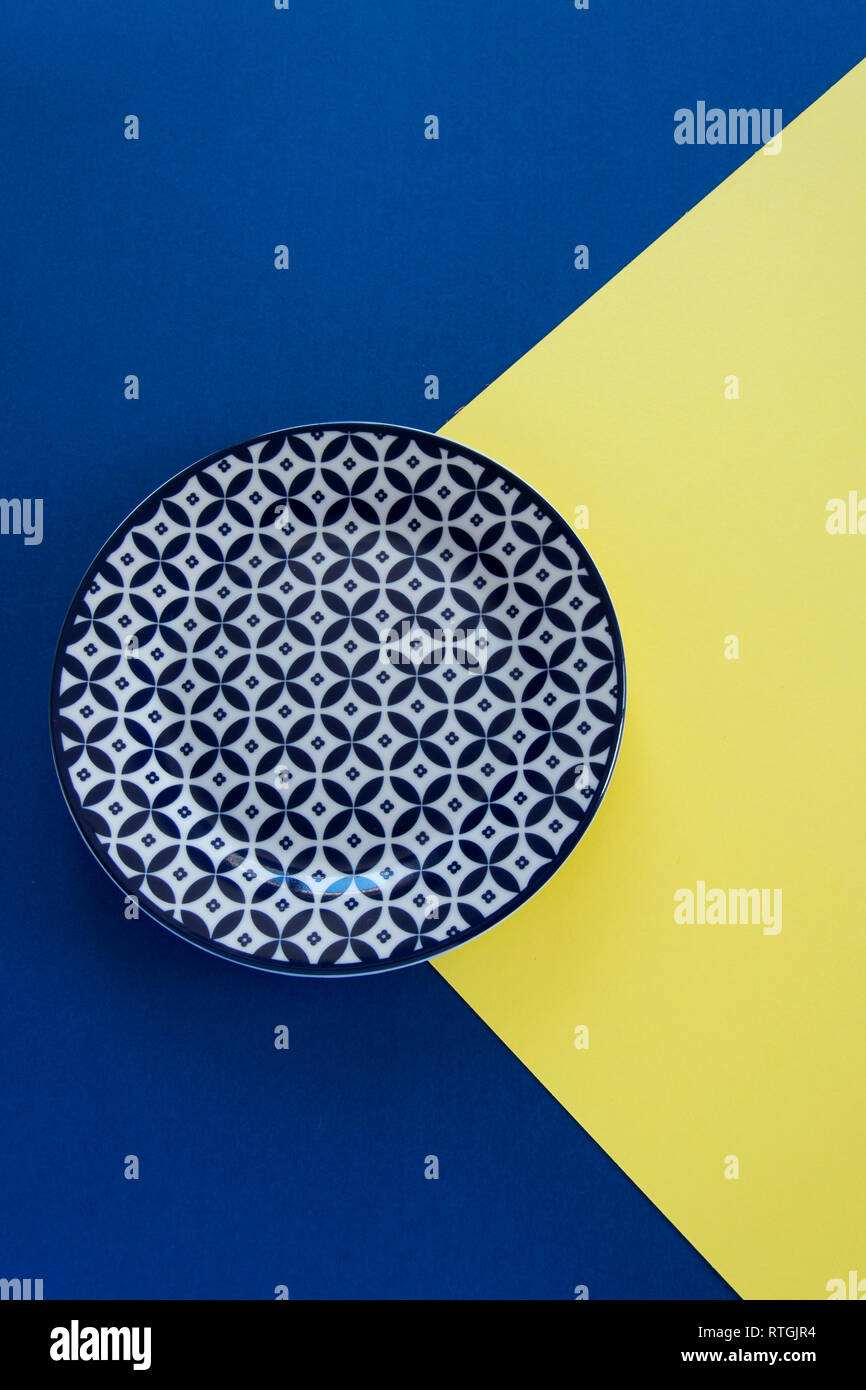 Abstract top view of modern blue plate on colorful background Stock ...