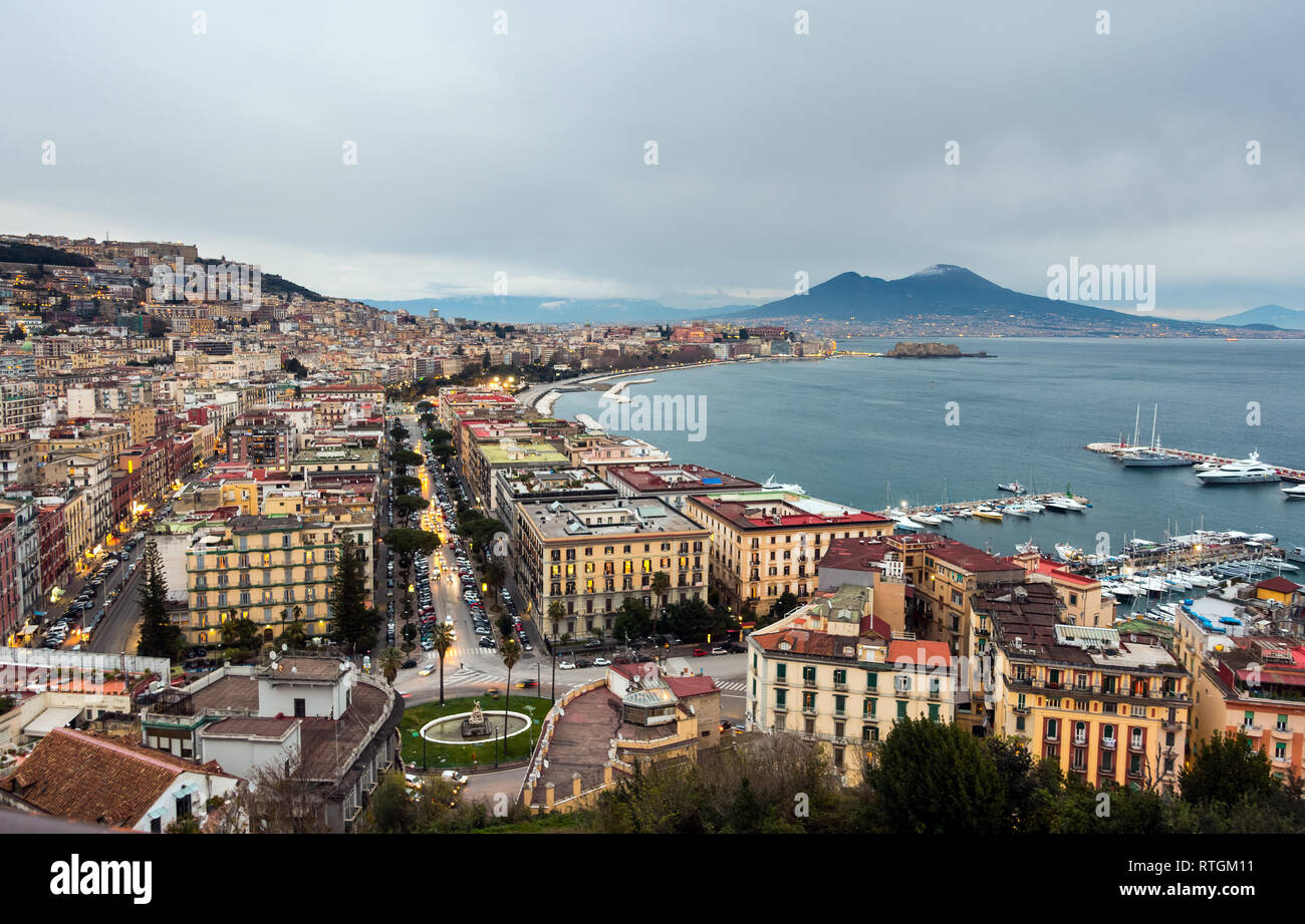 Naples, Italy. Evening city car traffic and the sea bay Stock Photo - Alamy