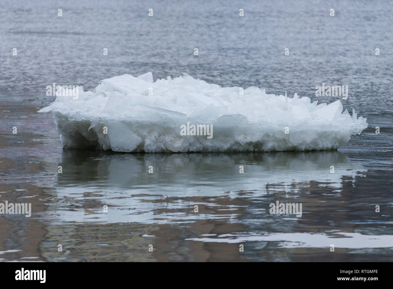 Small iceberg floats along river. Nature landscape Stock Photo - Alamy
