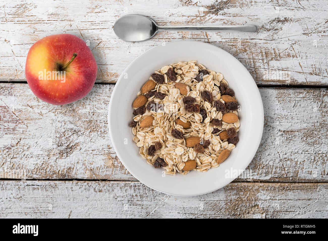 white plate with oat braids on white background Stock Photo - Alamy