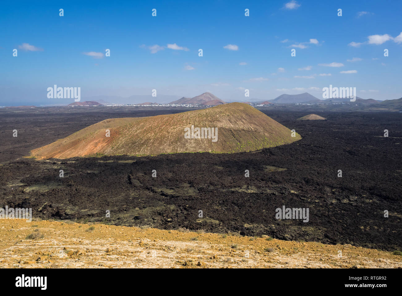 View from the trek to the Caldera Blanca Volcano in Lanzarote. Canary ...