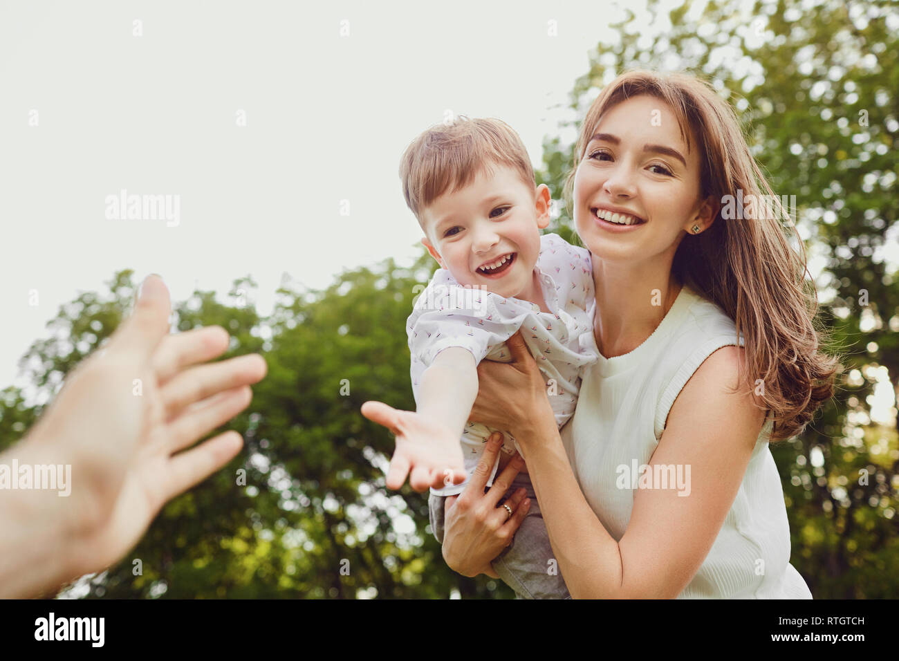 Mother and son are having fun in the park Stock Photo - Alamy