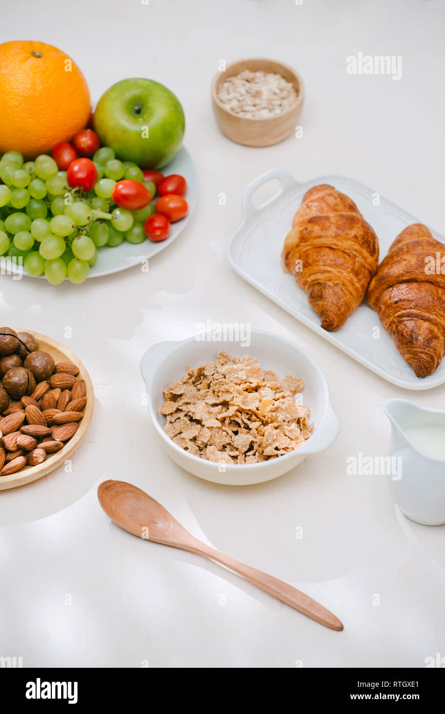 Light healthy Breakfast with oatmeal. Hercules, nuts, fruit, boiled ...