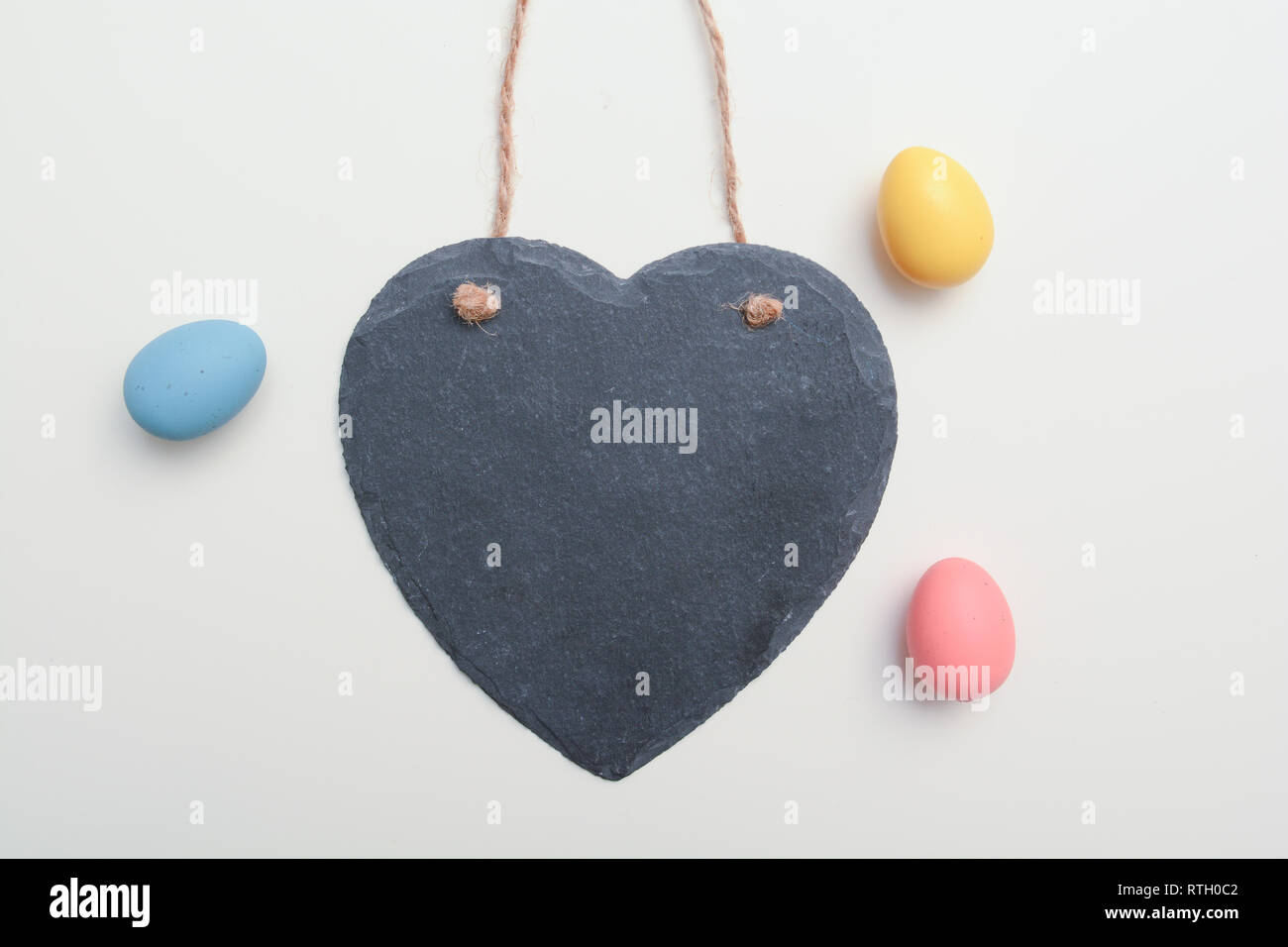 Easter eggs and heart. Blank for your Easter message Stock Photo - Alamy