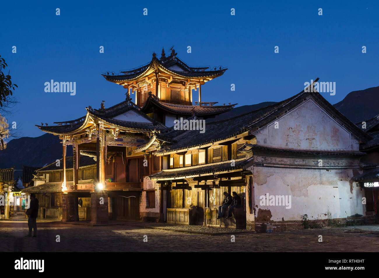 The old stage theatre at night in Sideng square, Shaxi, Yunnan, China ...