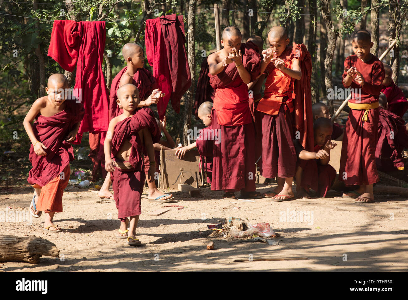 Novice monks play in a monastery in Nyaung U, Bagan, Myanmar (Burma ...