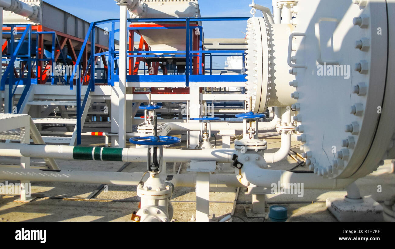 Heat exchangers in a refinery. The equipment for oil refining. Heated ...