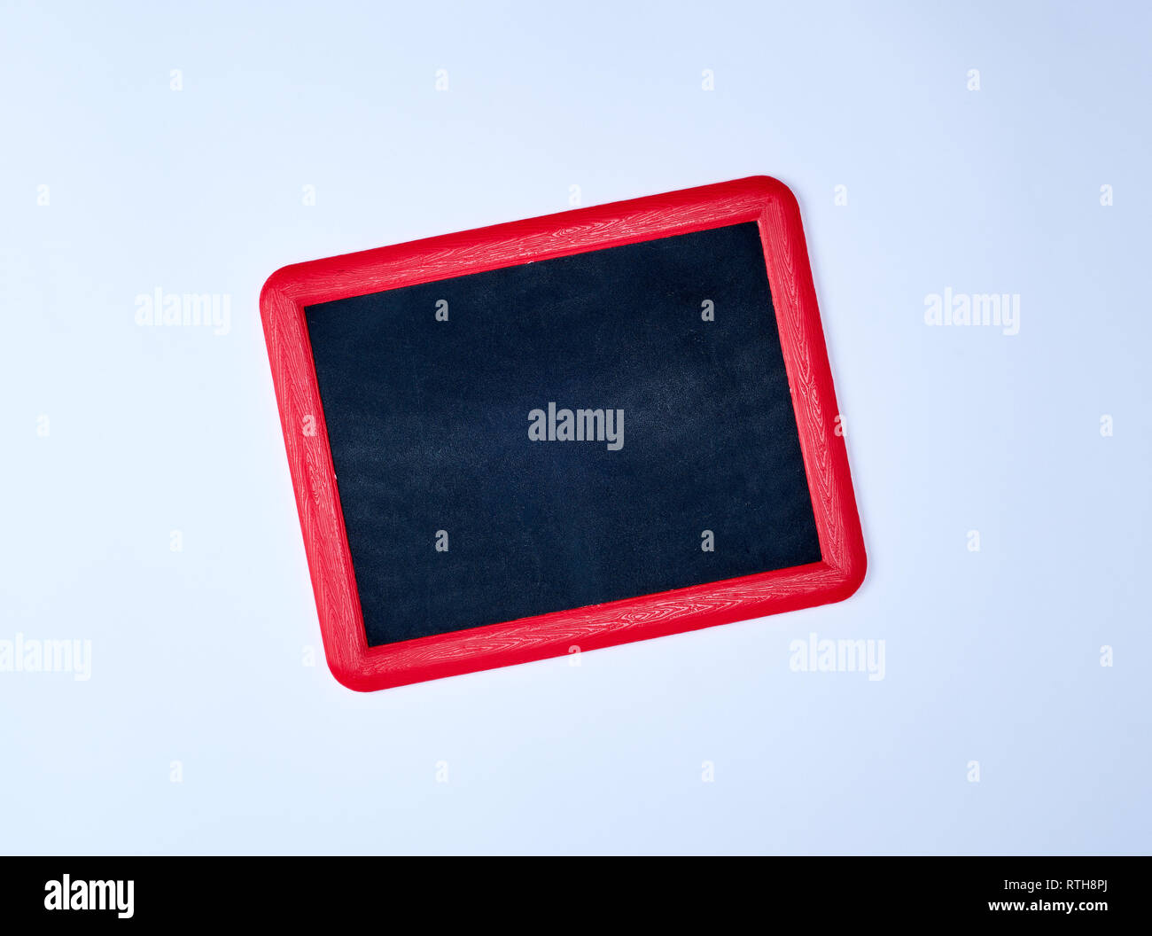 empty chalk board in red frame on white background, copy space Stock ...