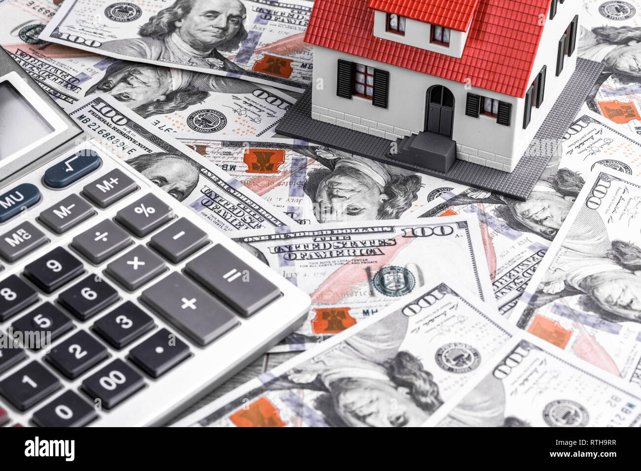 Buy house mortgage calculations calculator hi-res stock photography and ...