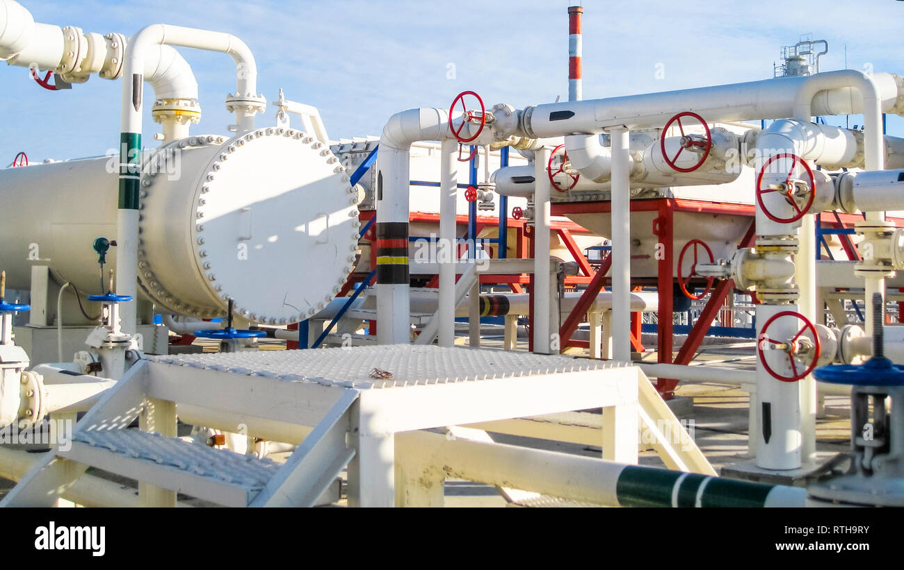 Heat exchangers in a refinery. The equipment for oil refining Stock ...