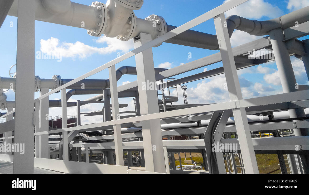 Latch on the pipeline. Oil refinery. Equipment for primary oil refining ...