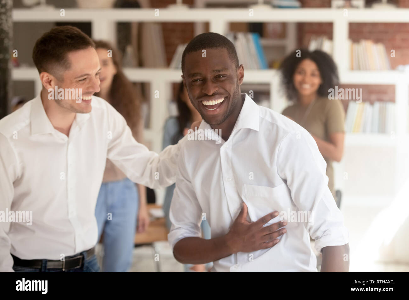 Successful black businessman looking at camera celebrating success got ...