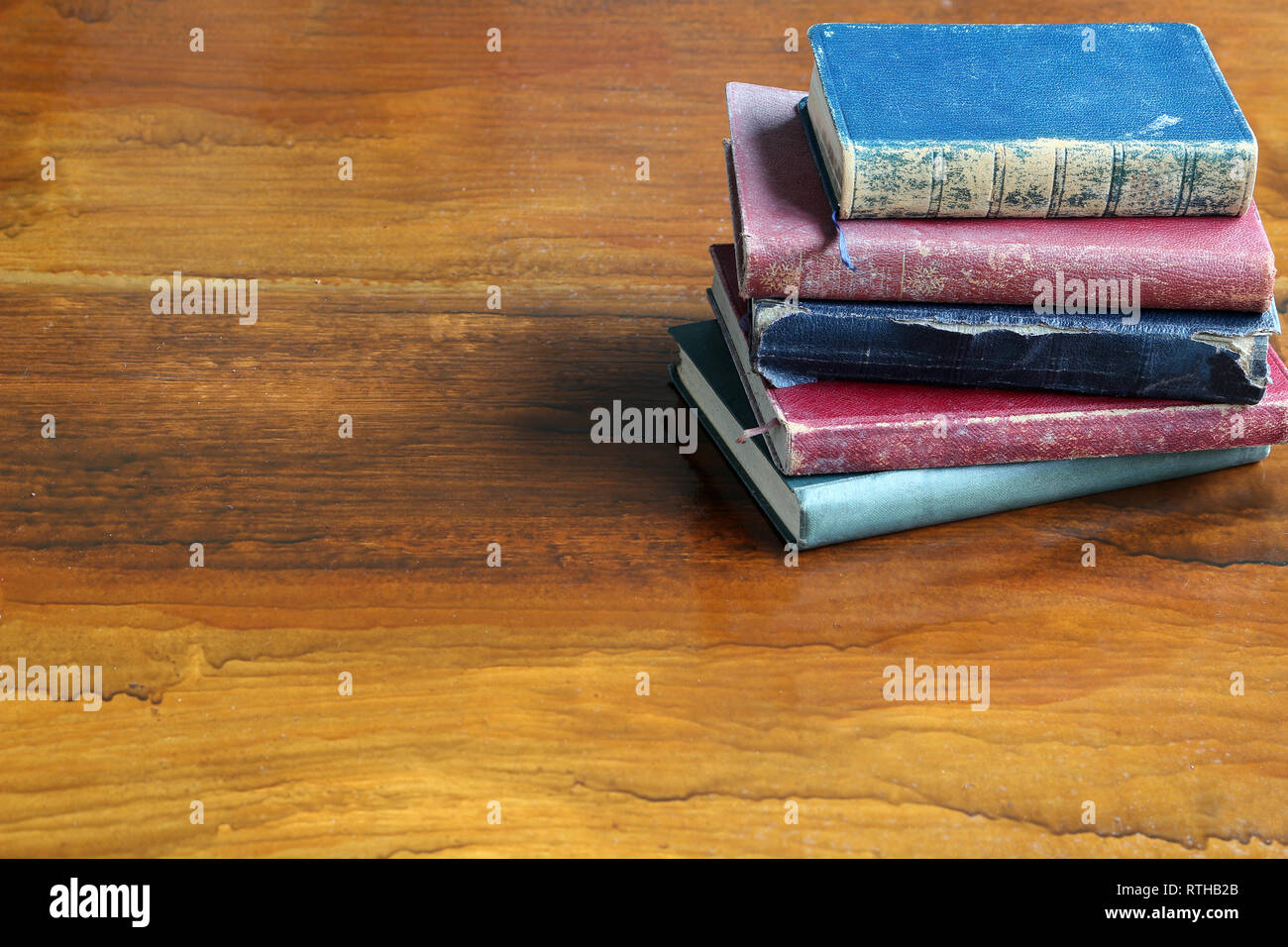 Leather books table hi-res stock photography and images - Alamy