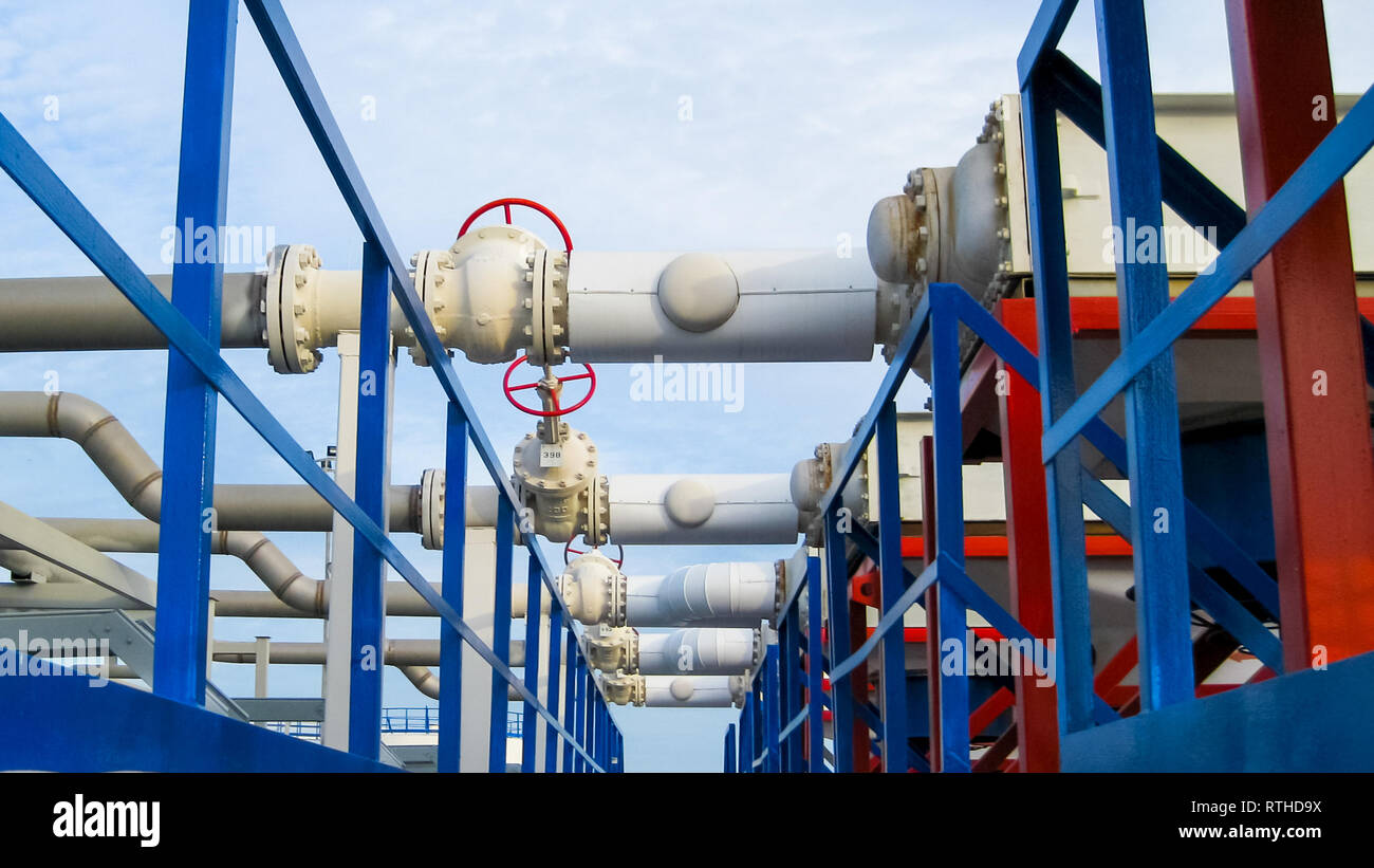 Steel service platform and stairs. Equipment refinery Stock Photo - Alamy