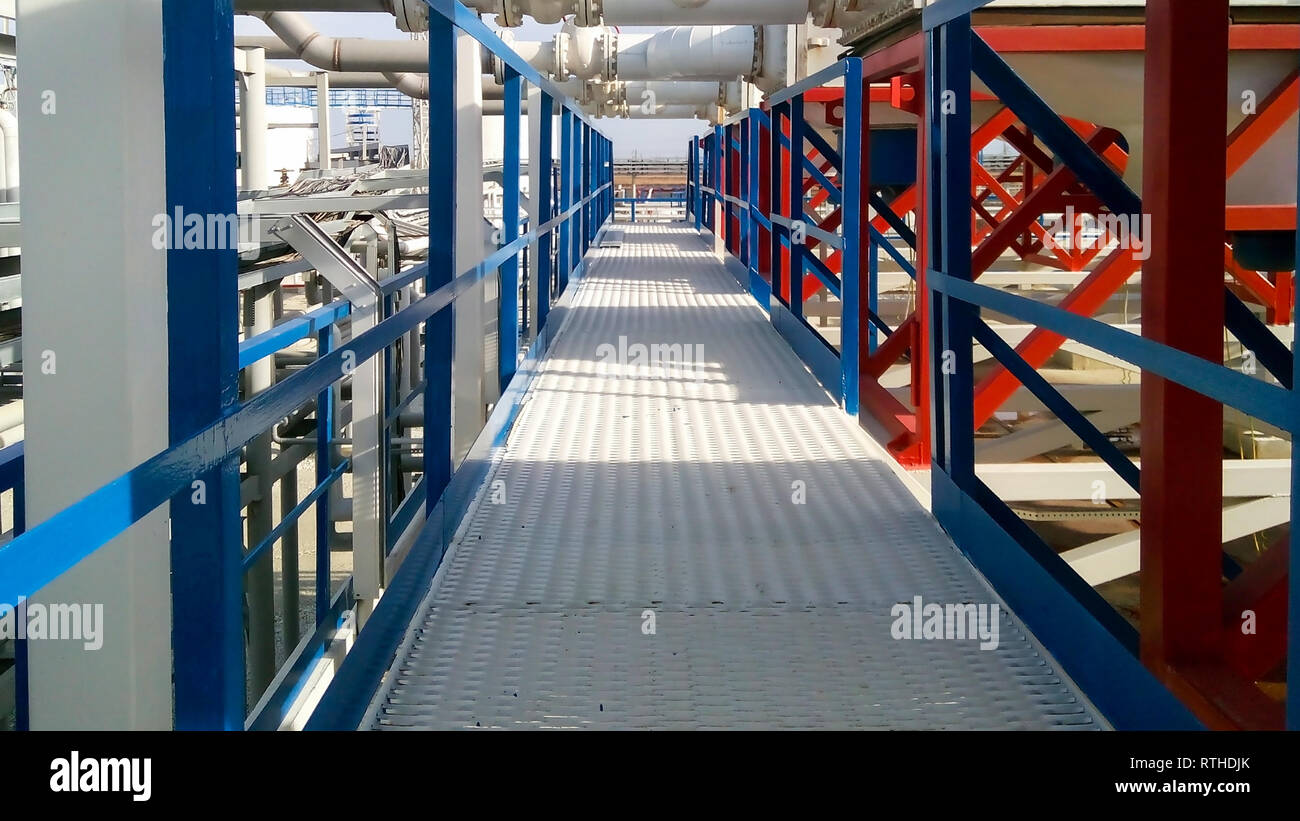 Steel service platform and stairs. Equipment refinery Stock Photo - Alamy