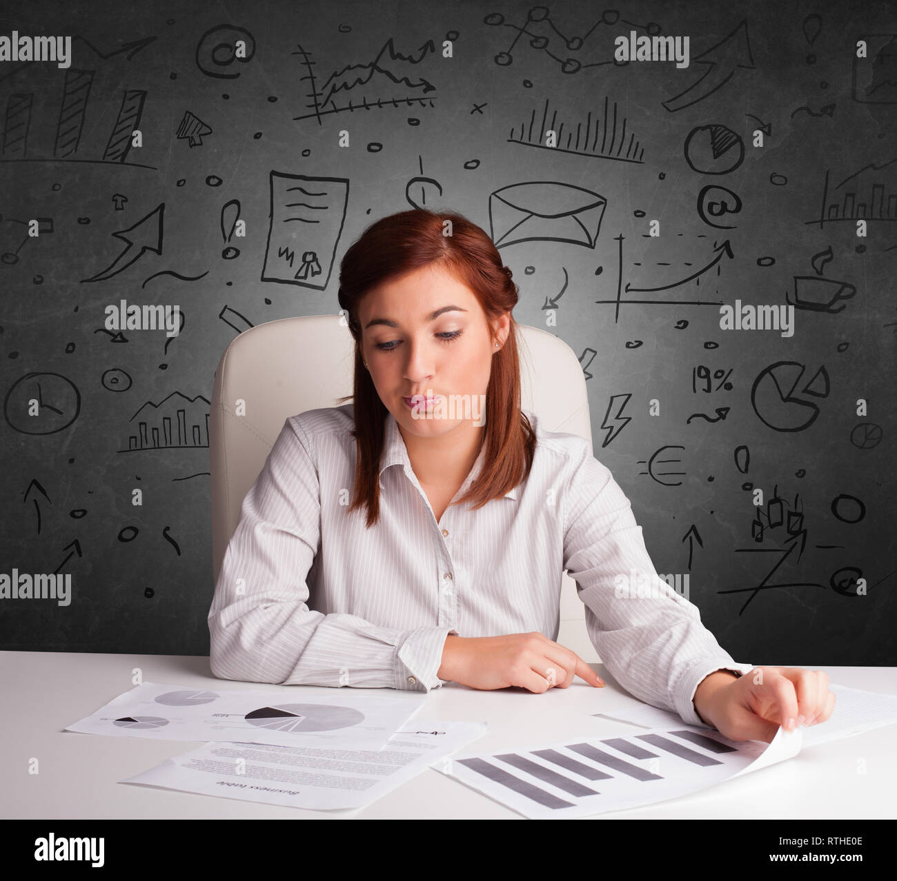 Young secretary with doodle multitask concept Stock Photo - Alamy