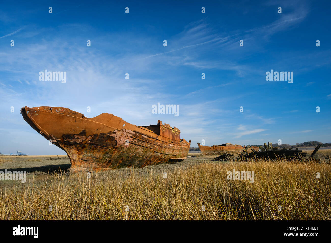 Rusting boat wrecks on the shore of the River Wyre estuary at Fleetwood in Lancashire, UK Stock ...