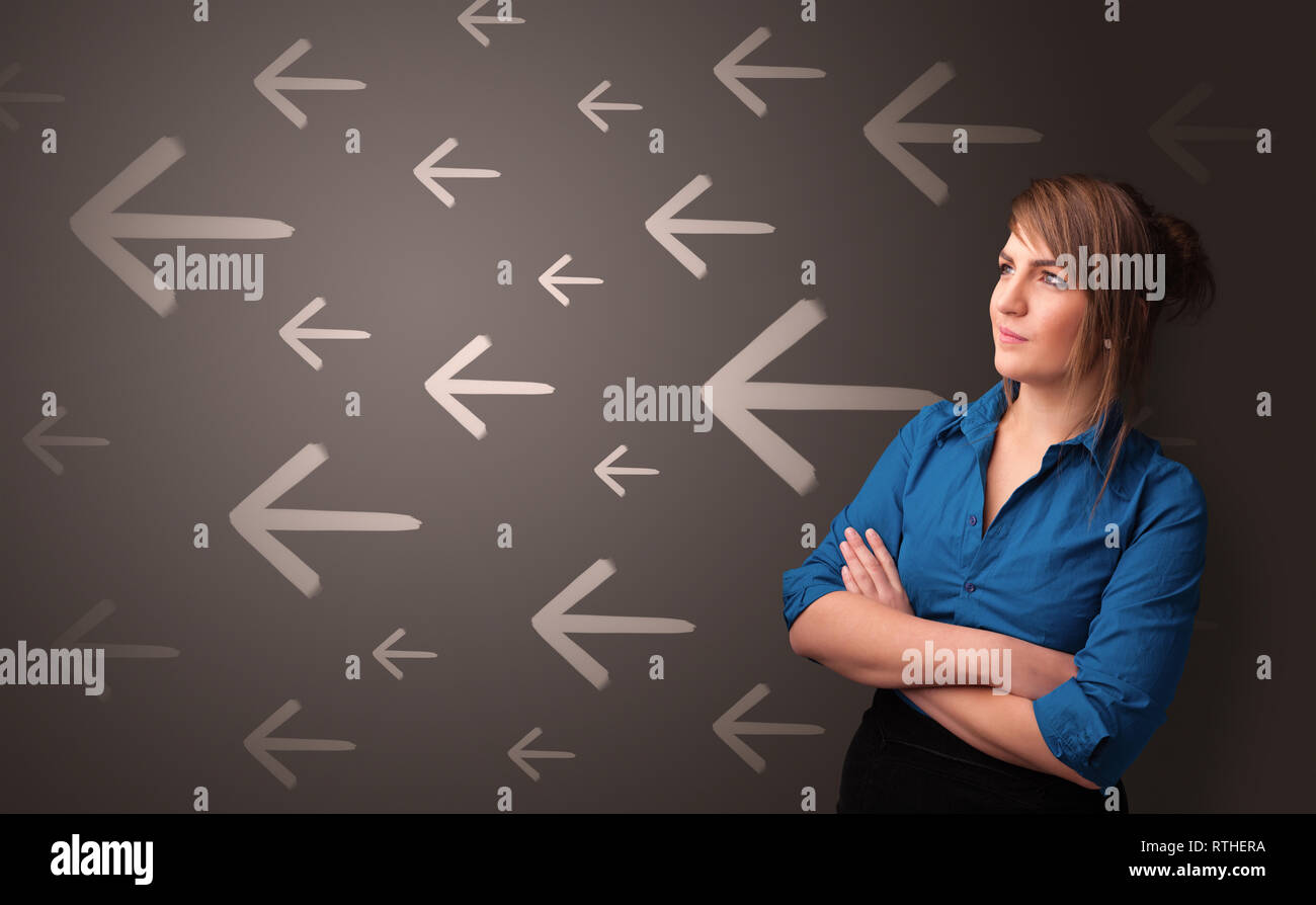 Young person thinking with direction concept background Stock Photo - Alamy
