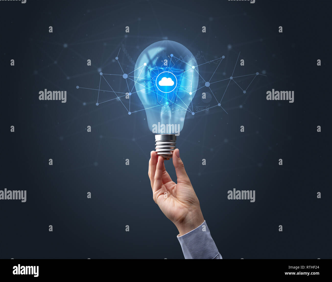 Hand holding light bulb on dark background. Networking idea concept ...
