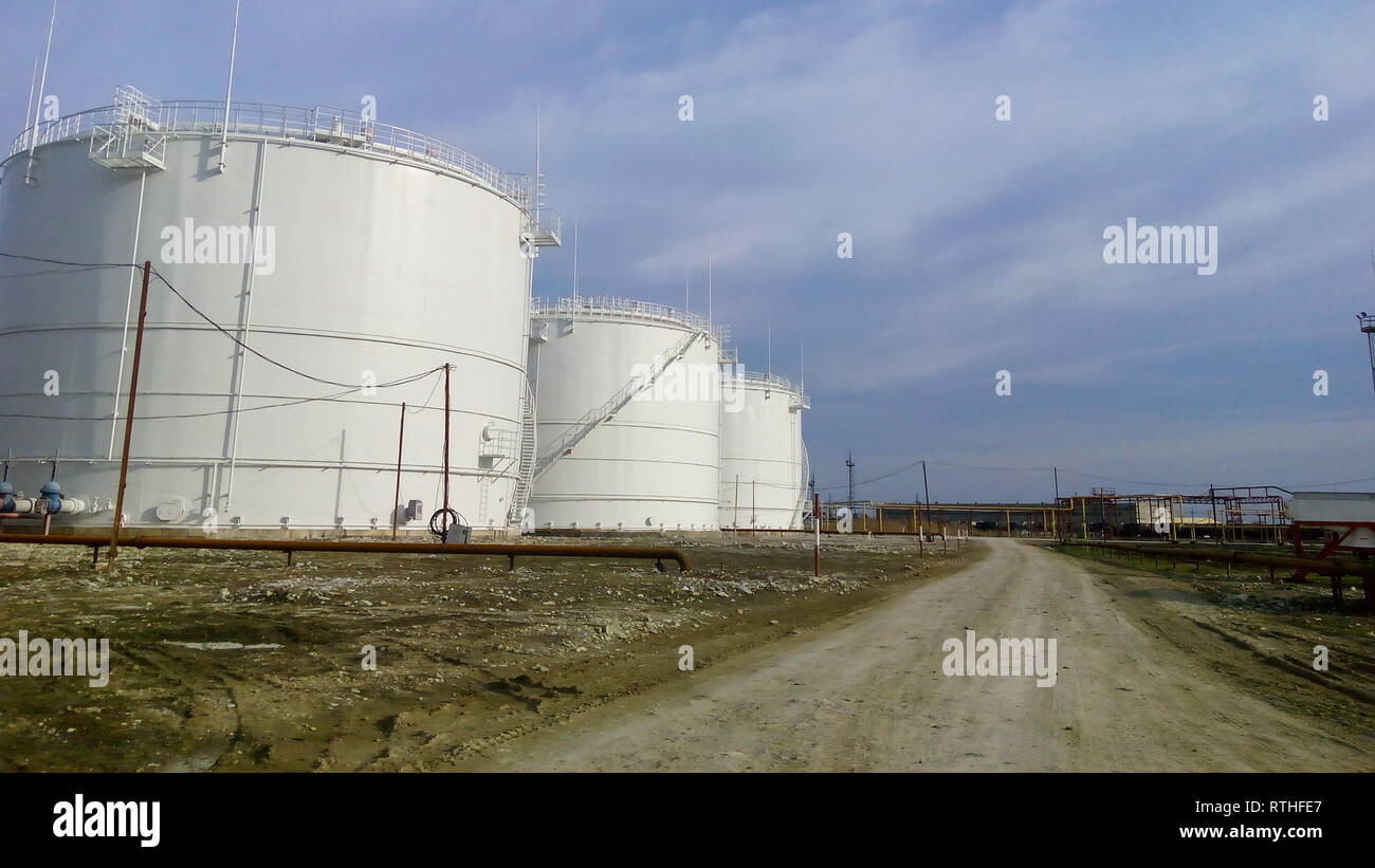 Storage tanks for petroleum products. Equipment refinery Stock Photo ...