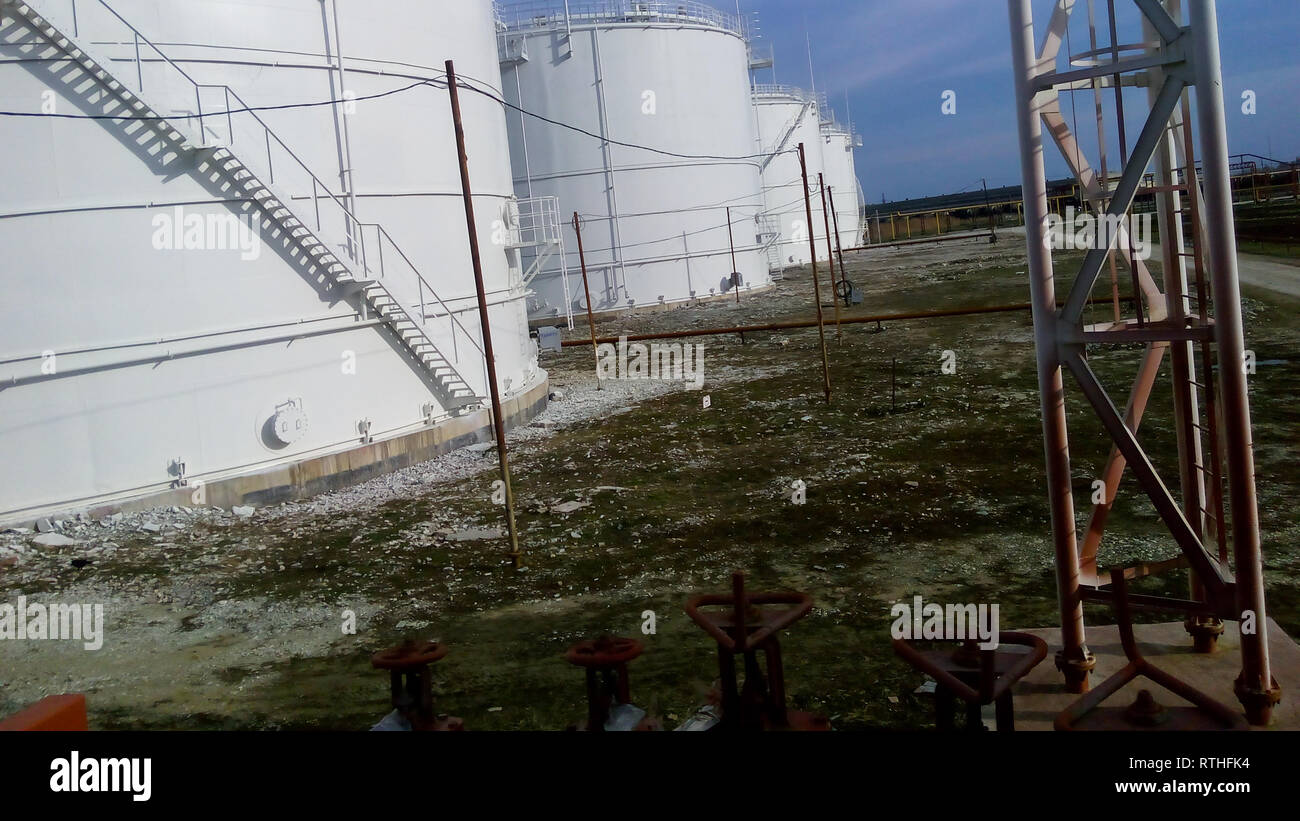 Storage tanks for petroleum products. Equipment refinery Stock Photo ...