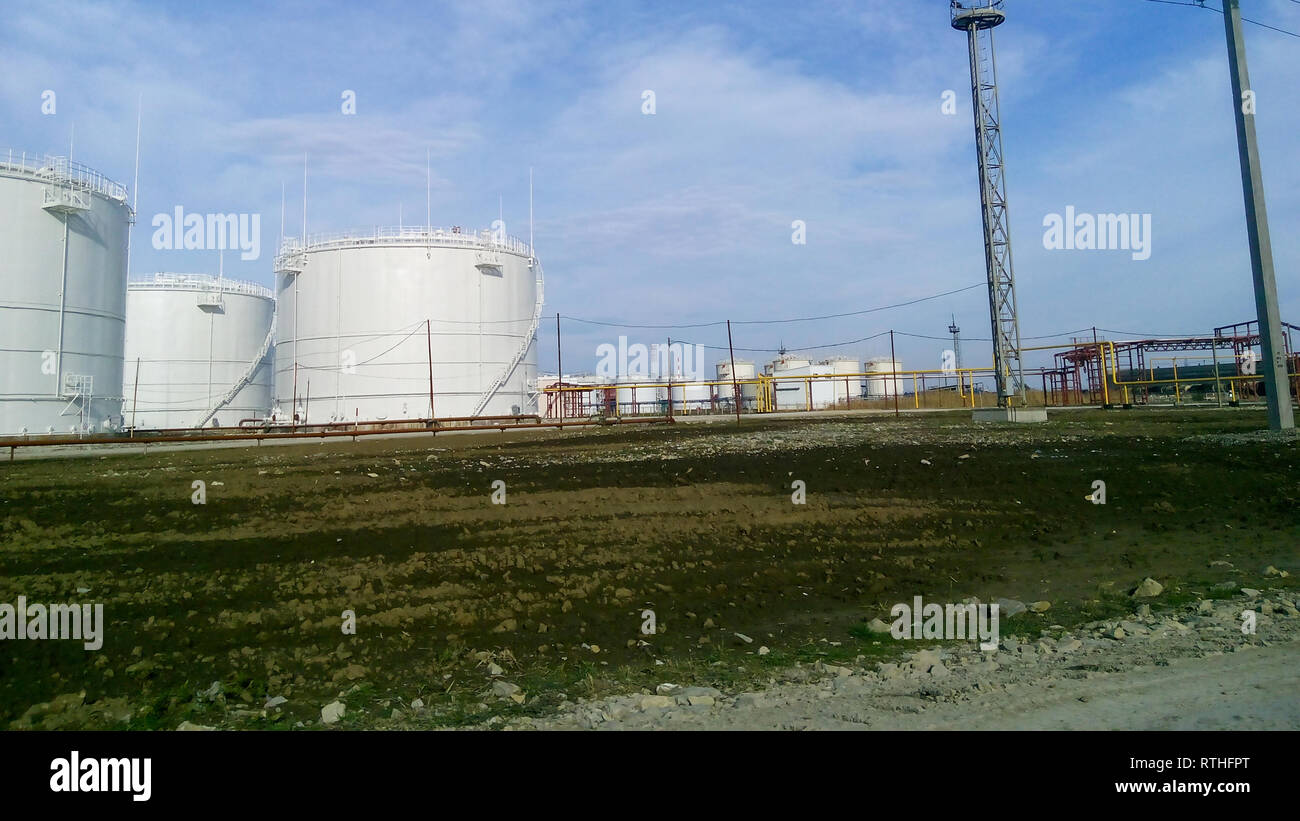 Storage tanks for petroleum products. Equipment refinery Stock Photo ...