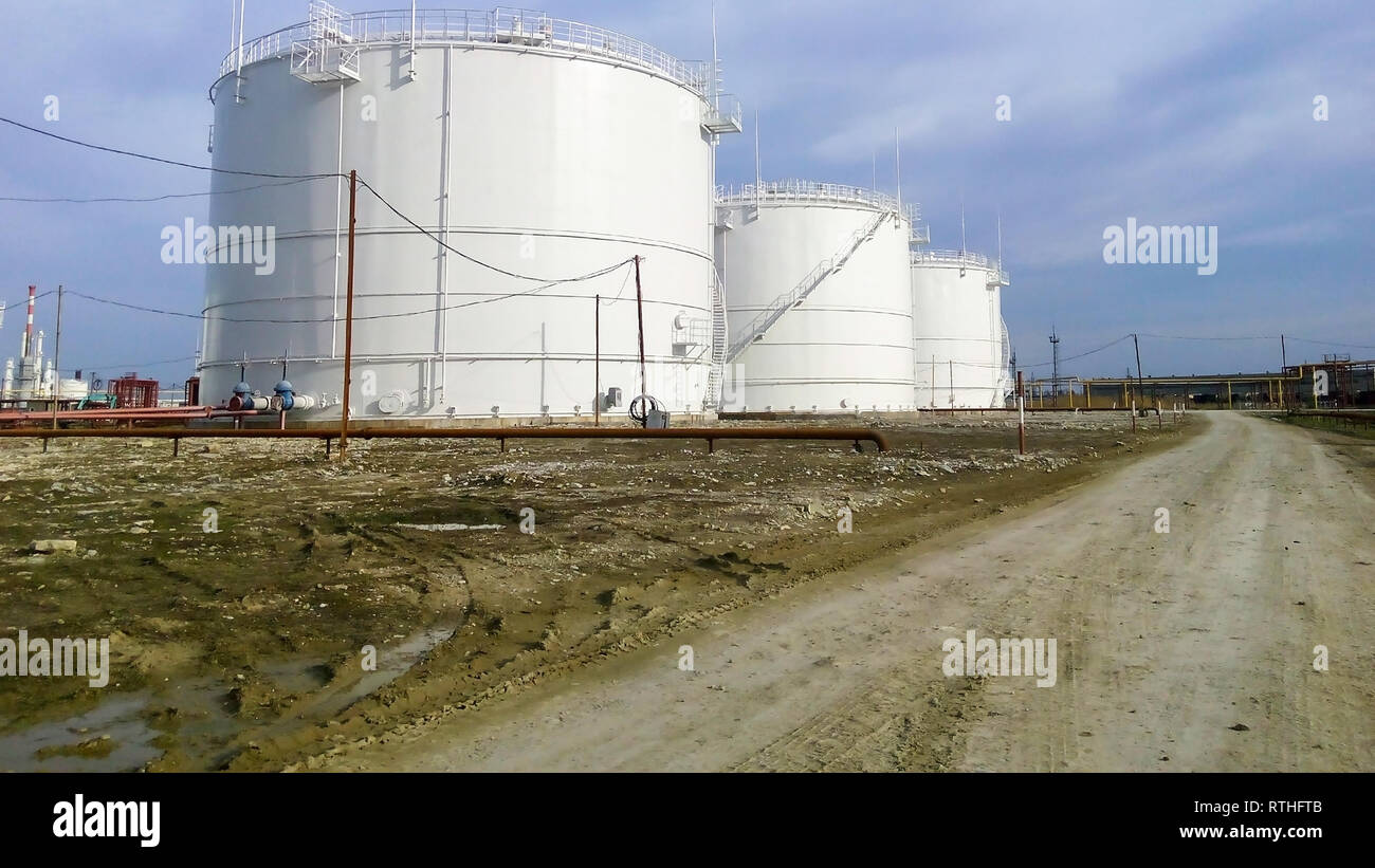 Storage tanks for petroleum products. Equipment refinery Stock Photo ...