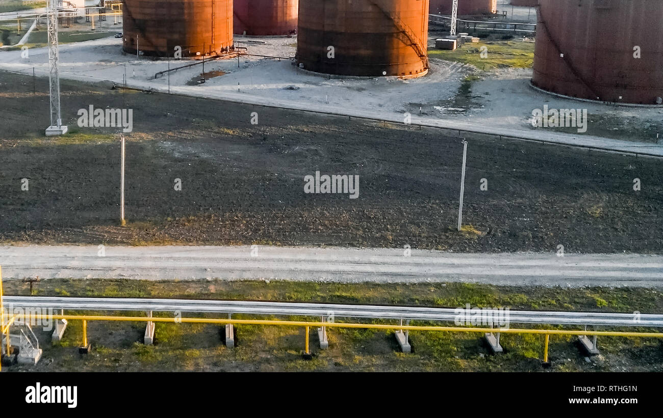 Tank the vertical steel. Oil refinery. Equipment for primary oil ...