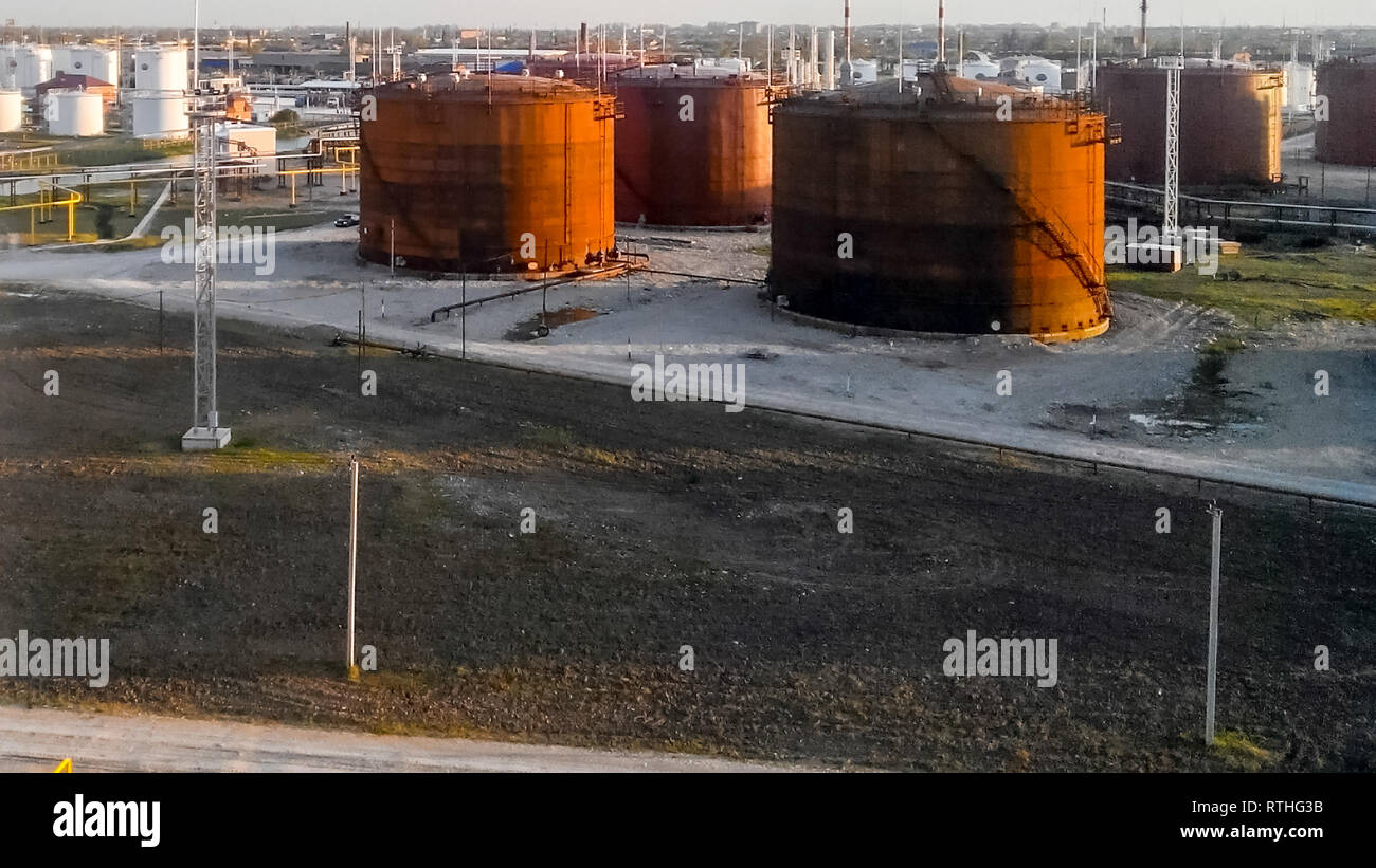 Tank the vertical steel. Oil refinery. Equipment for primary oil ...