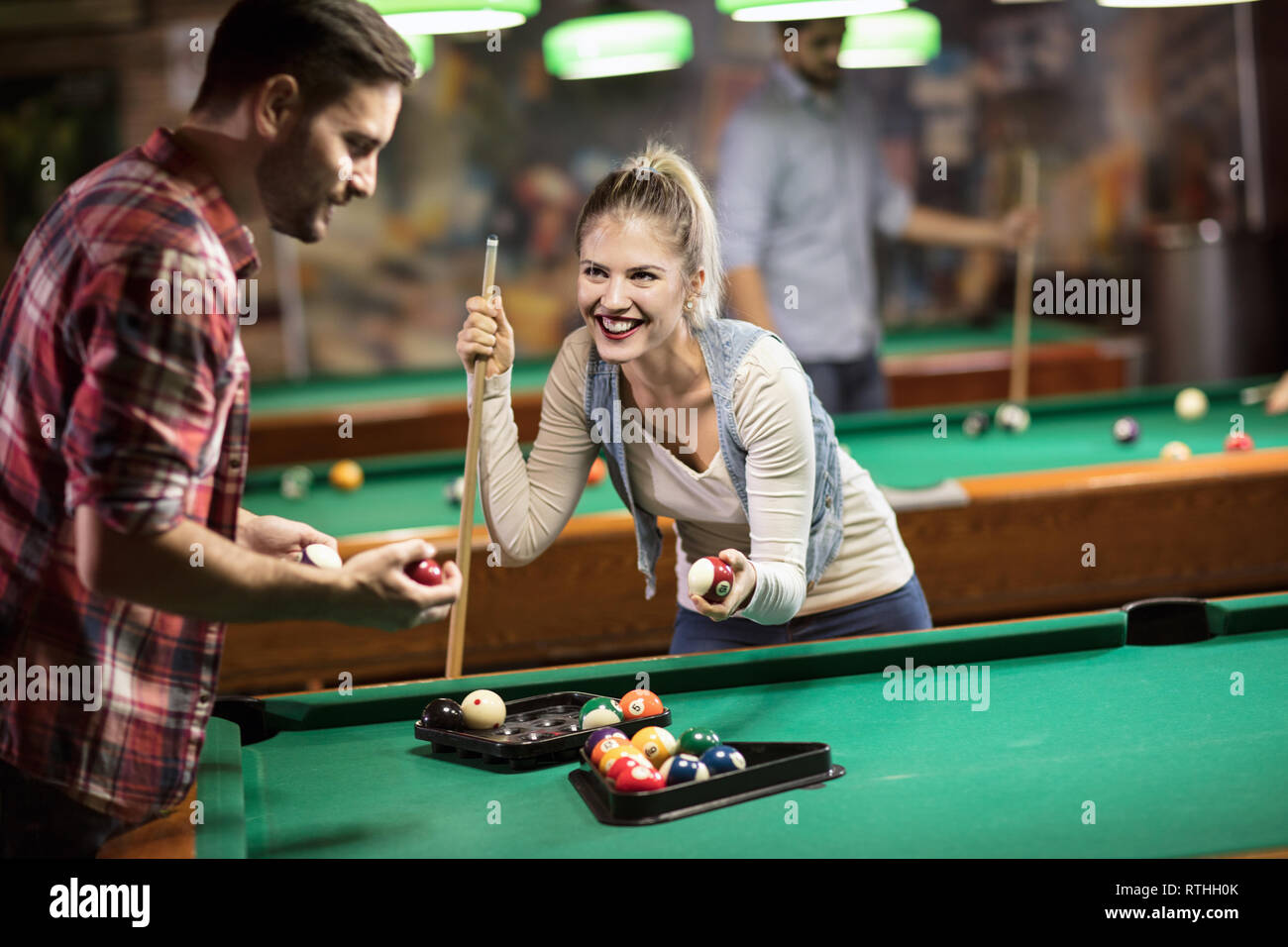 Woman in billiard hall hi-res stock photography and images - Alamy