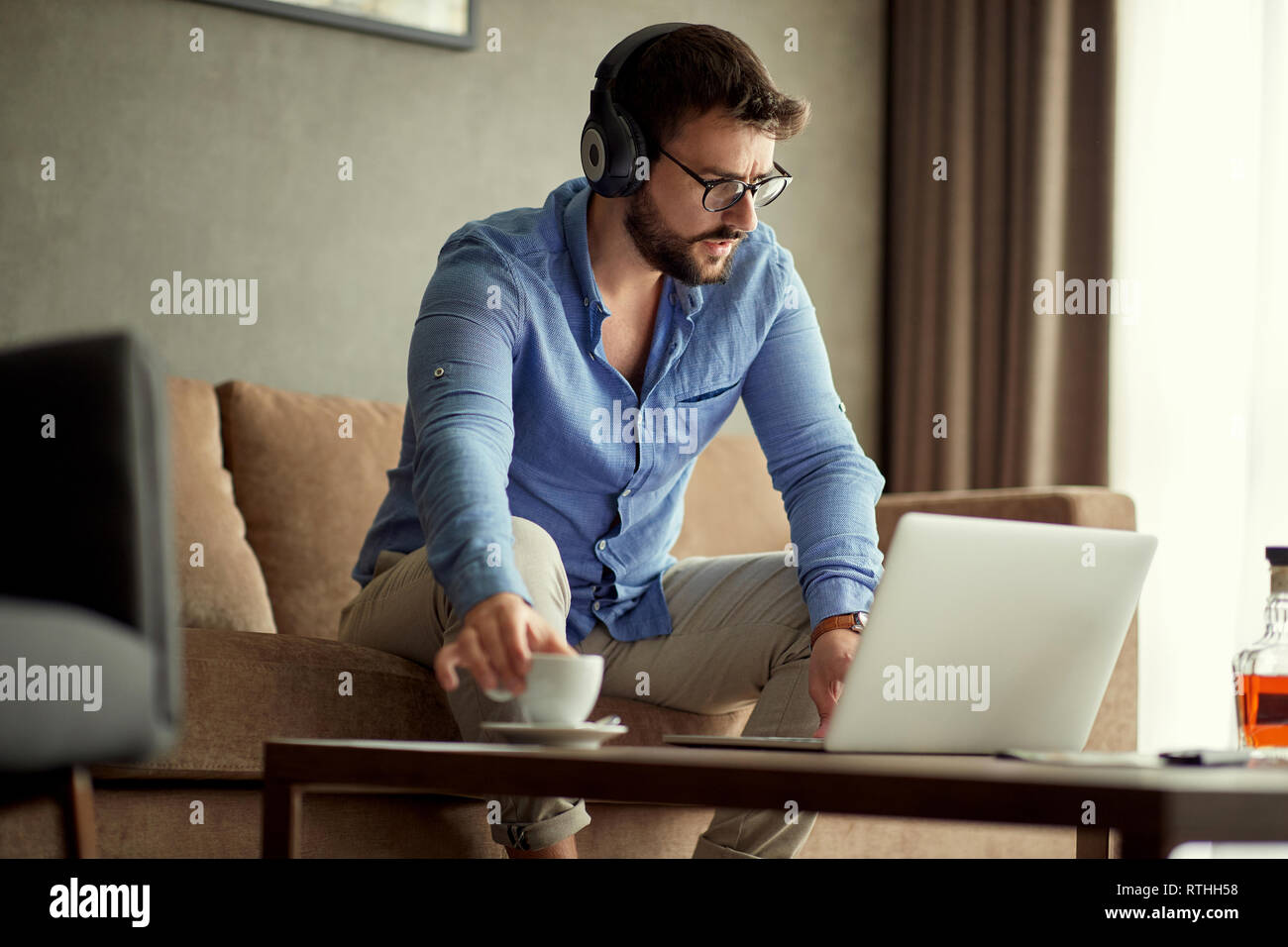 people working at home- young man works at home at business project ...